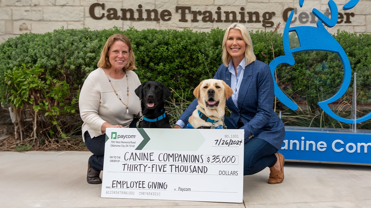 Paycom employees support Canine Companions with donation and service ...